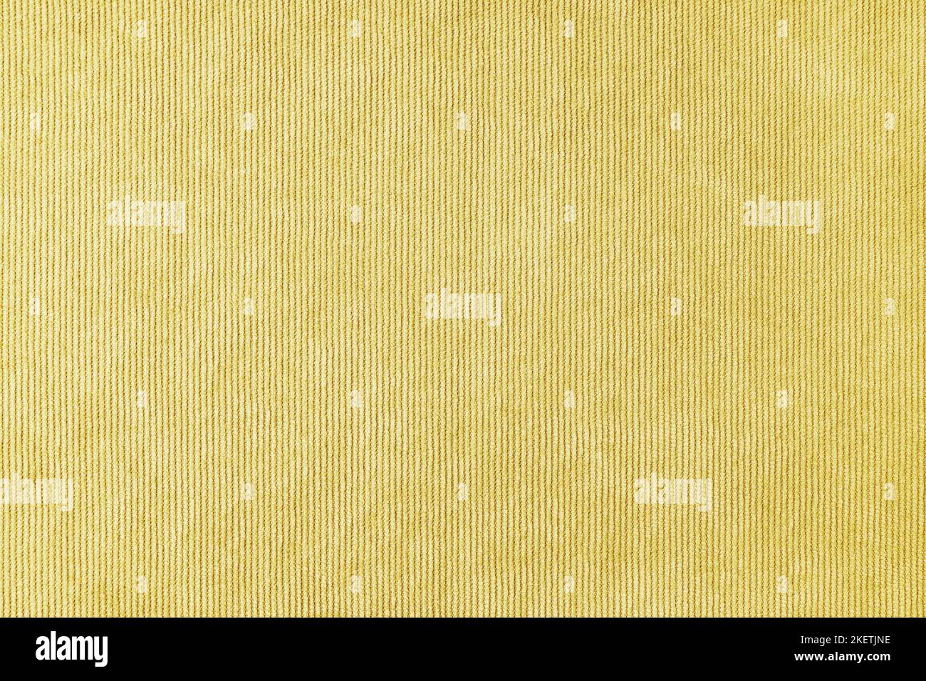 Texture background of velours yellow fabric. Upholstery velveteen ...