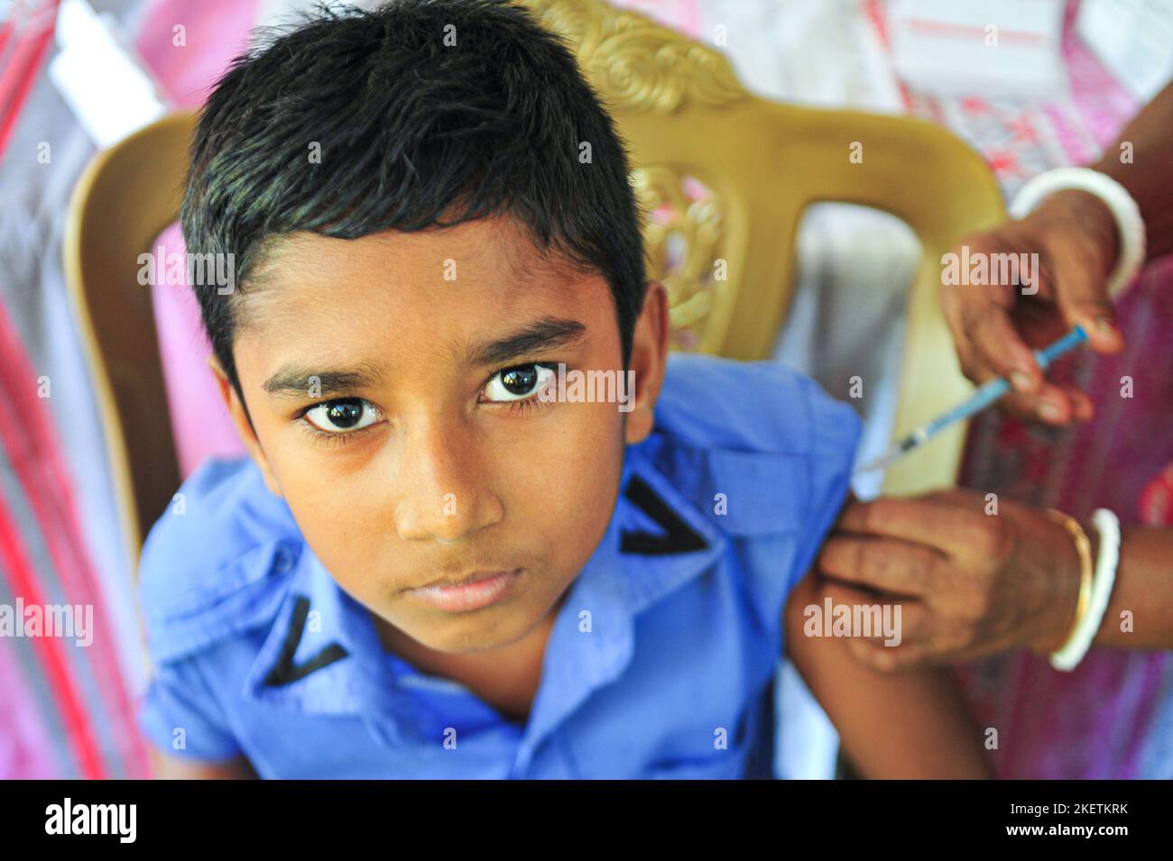 Non Exclusive: Nov 13 2022 Sylhet, Bangladesh: A child receives the ...