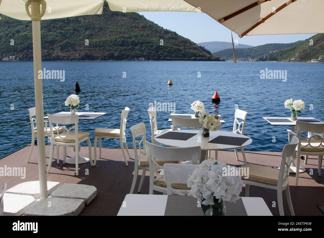 Montenegro, Perast, view on the cafe and Kotor Bay Stock Photo - Alamy