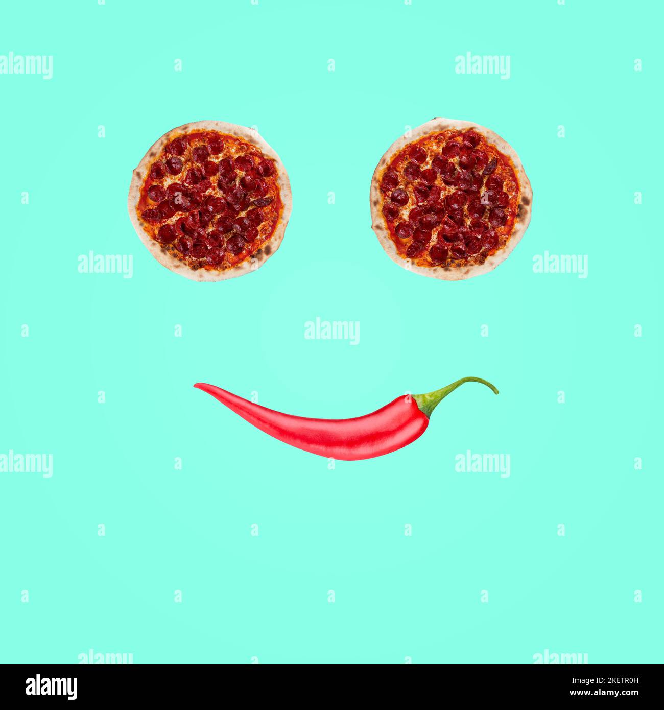 Pepperoni and chilli salami pizza. Smiling pizza. Modern food concept ...