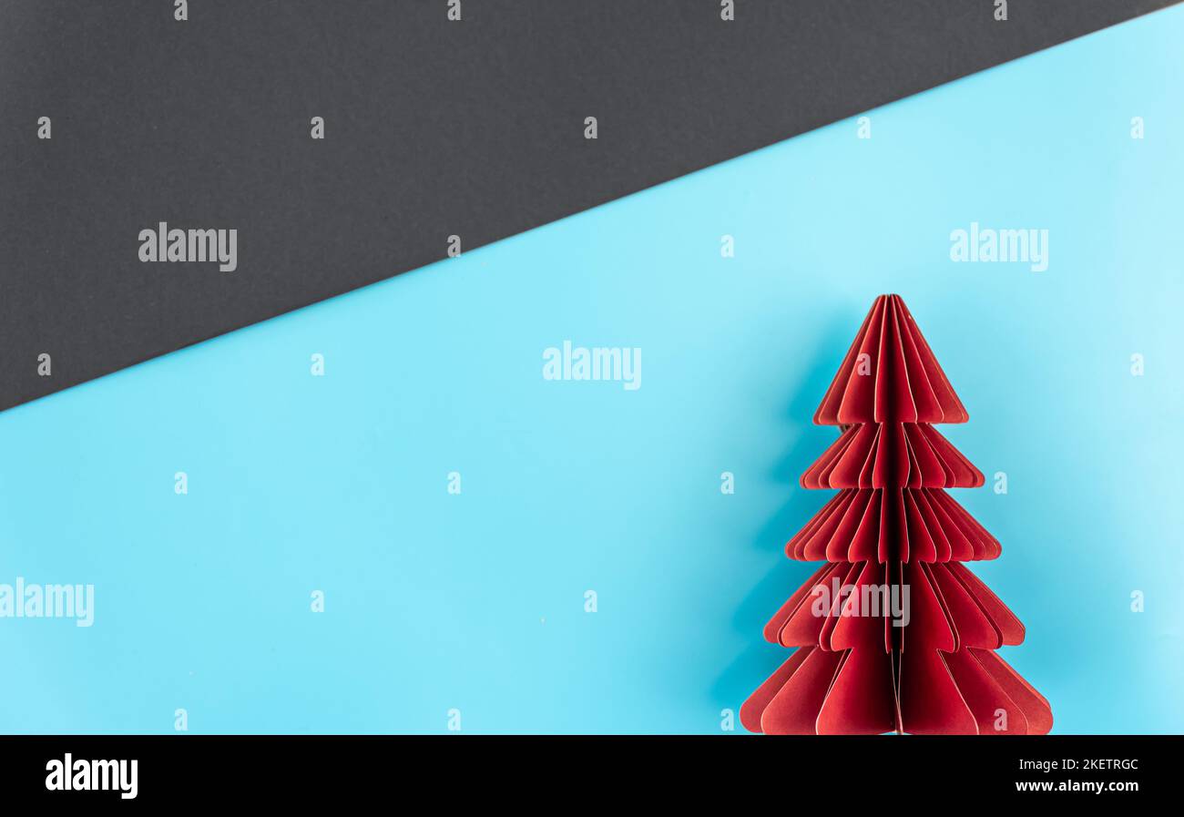 Christmas background with origami paper tree on paper background, flat ...