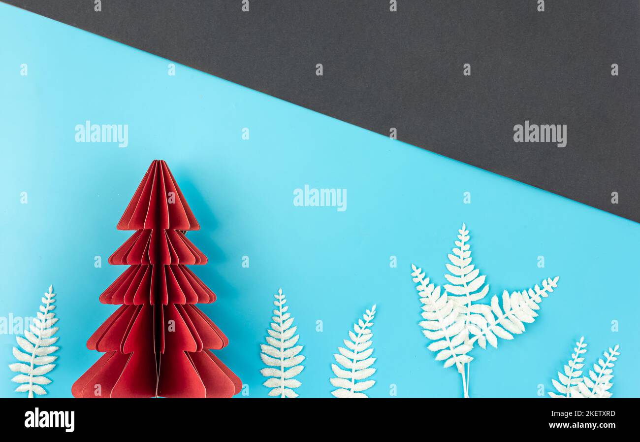 Christmas background with origami paper tree on paper background, flat ...
