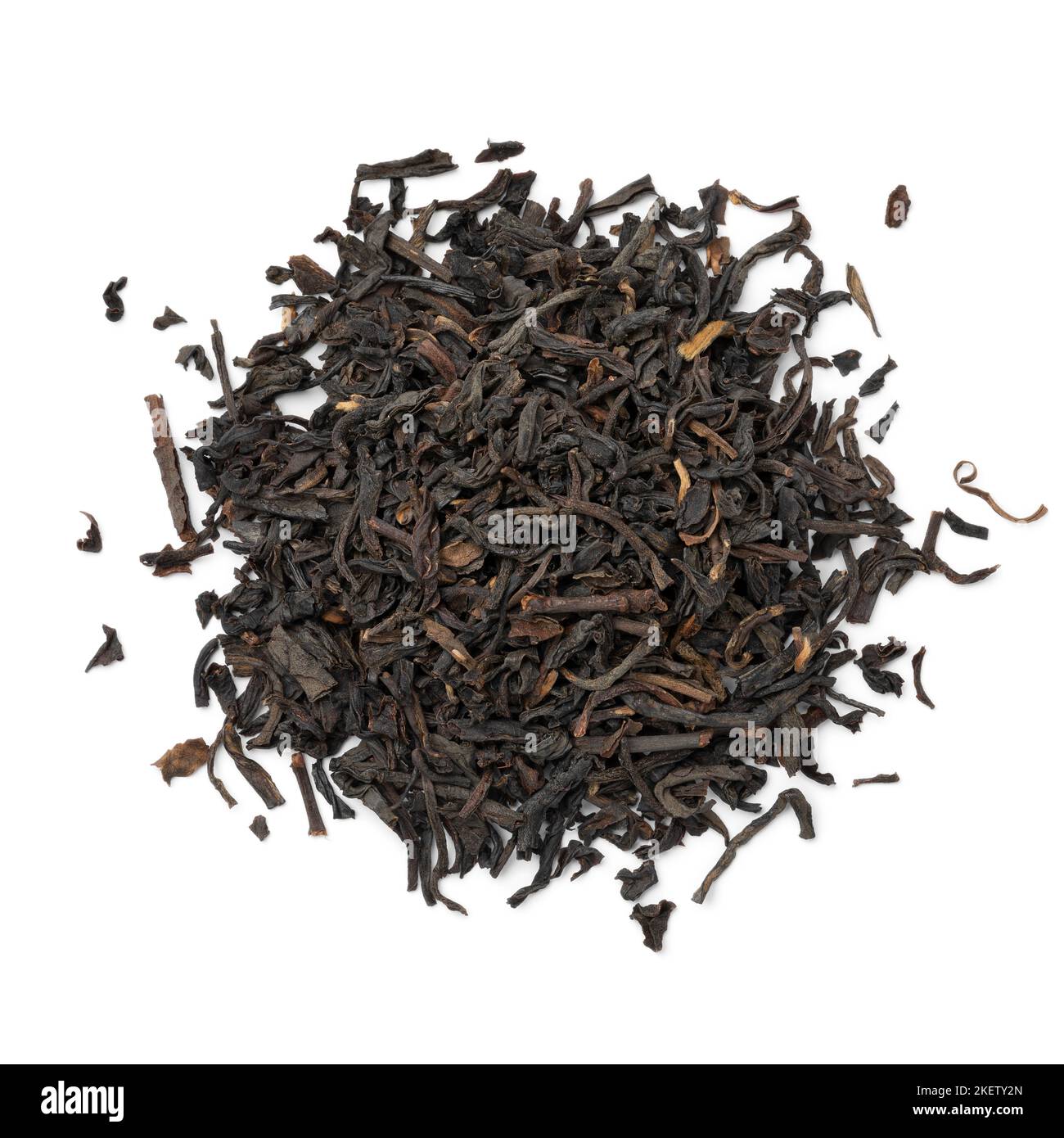 Heap of Chinese Keemun dried tea leaves close up isolated on white ...