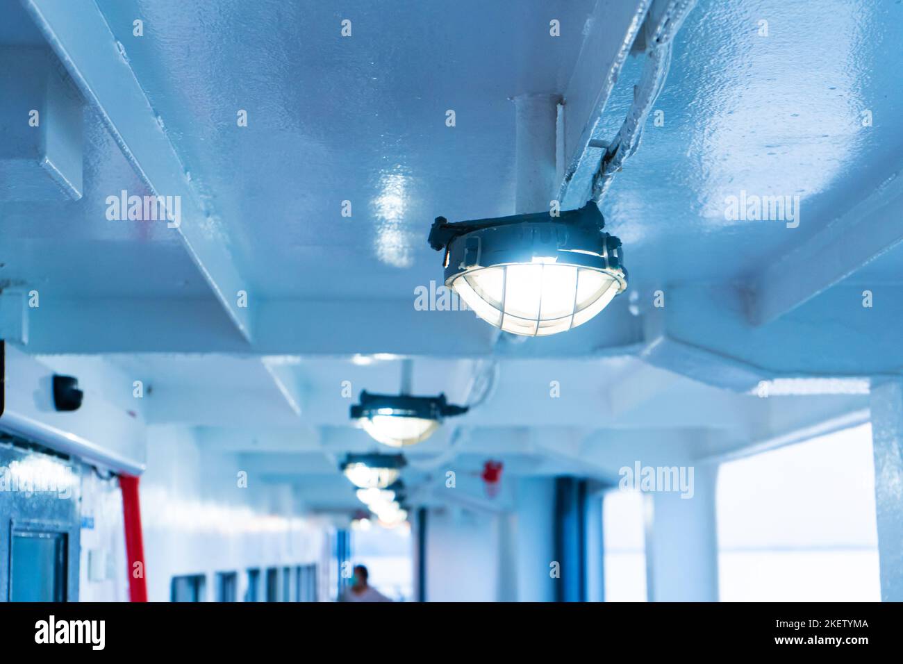 Emergency lighting system. Lamps protected by a grill Stock Photo - Alamy