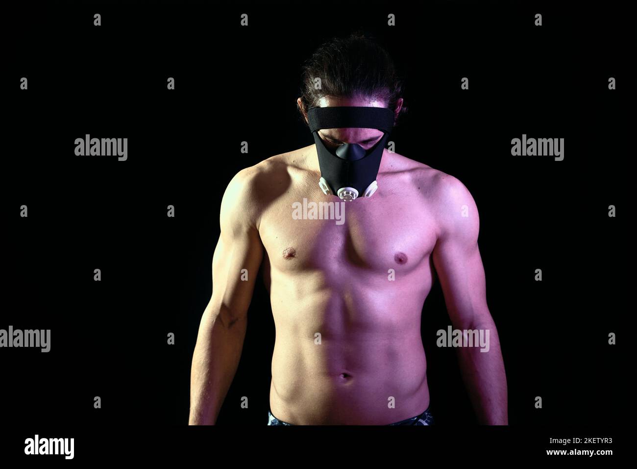 Fit young man training alone despite coronavirus pandemic using a ...