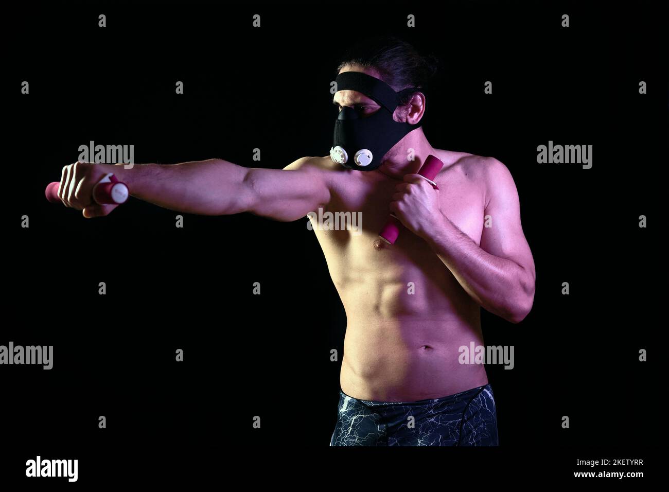 Fit young man training alone despite coronavirus pandemic using a ...