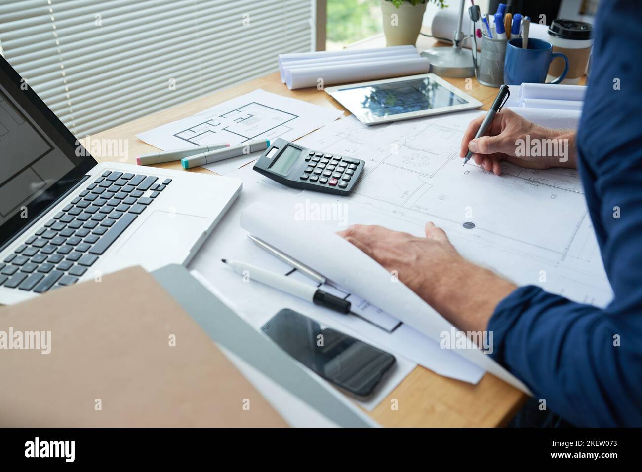 Engineer man working blueprint tablet hi-res stock photography and ...