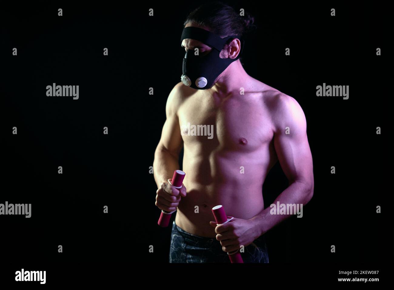 Fit young man training alone despite coronavirus pandemic using a ...