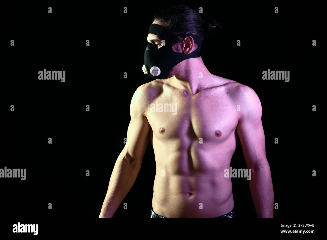 Fit young man training alone despite coronavirus pandemic using a ...