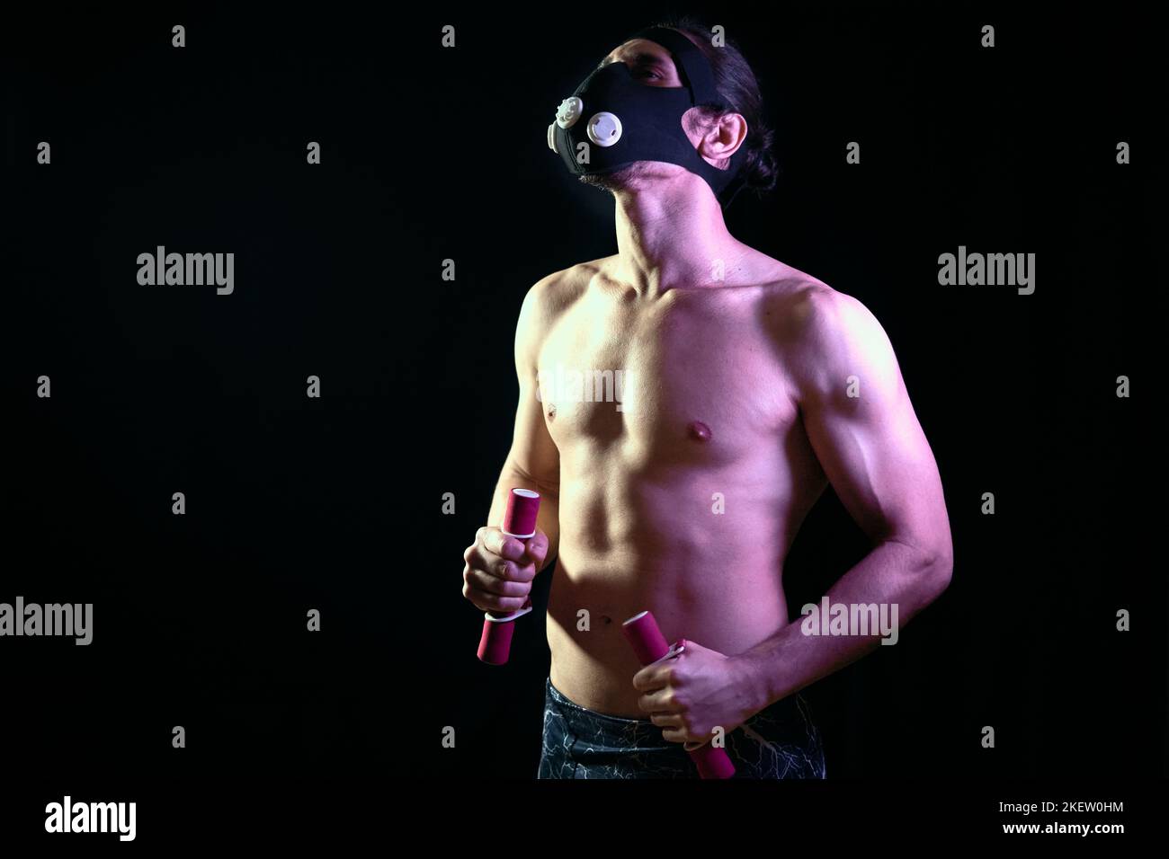 Fit young man training alone despite coronavirus pandemic using a ...