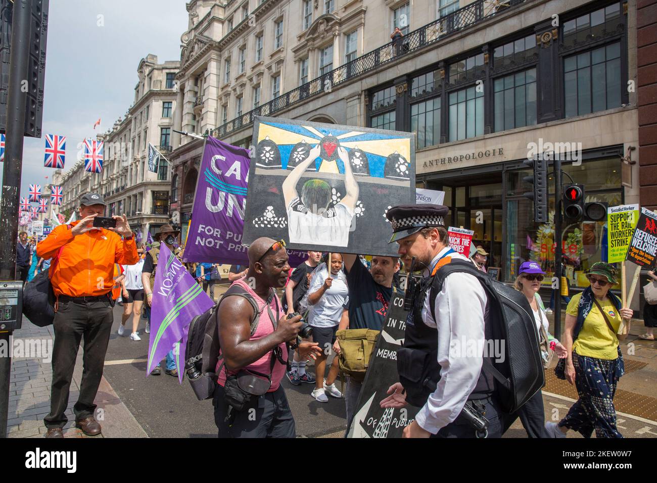Participants gather and march during ‘We demand better’ demonstration ...