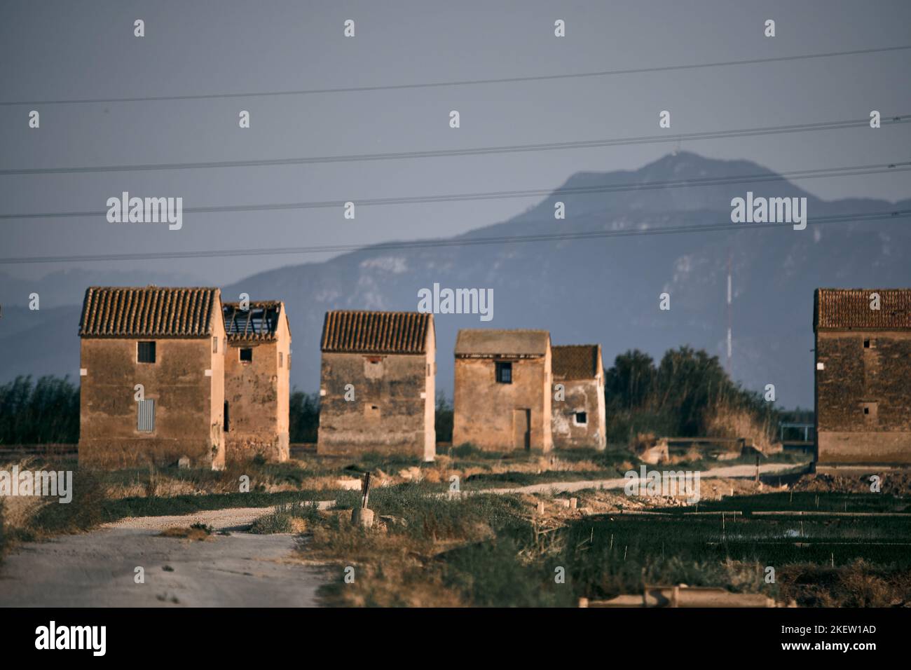 set of abandoned houses together in a line with the roof in poor ...