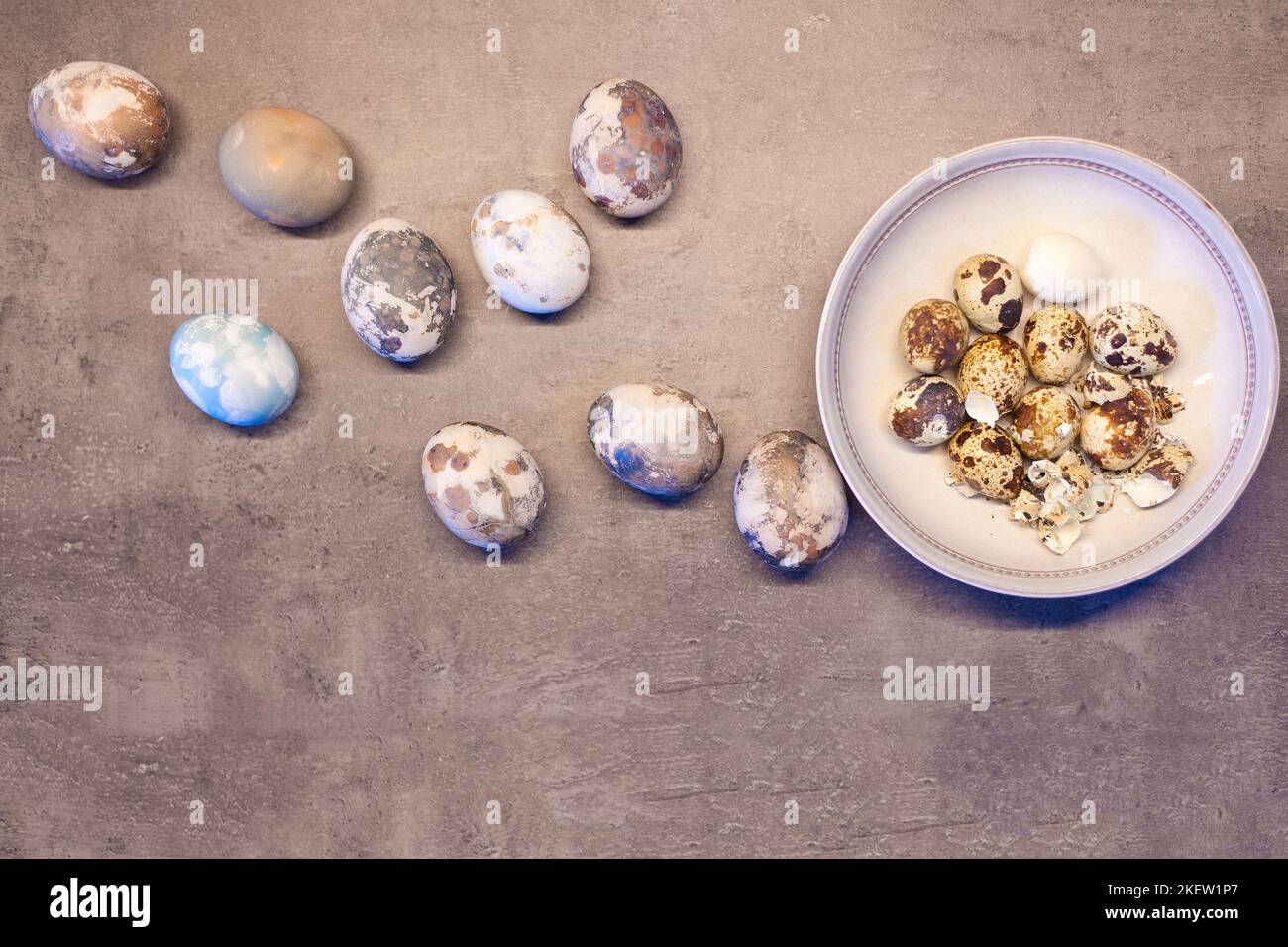 eggs on concrete. Happy Easter card: marble stone effect painted. top ...