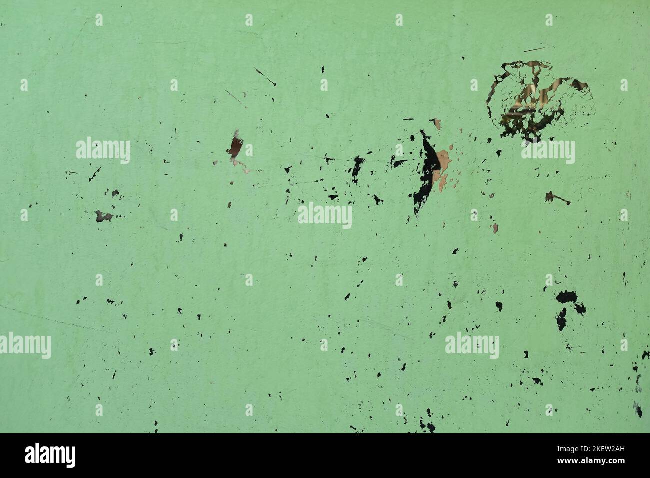 Chipped green paint and scratches on glass surface. Abstract grunge ...