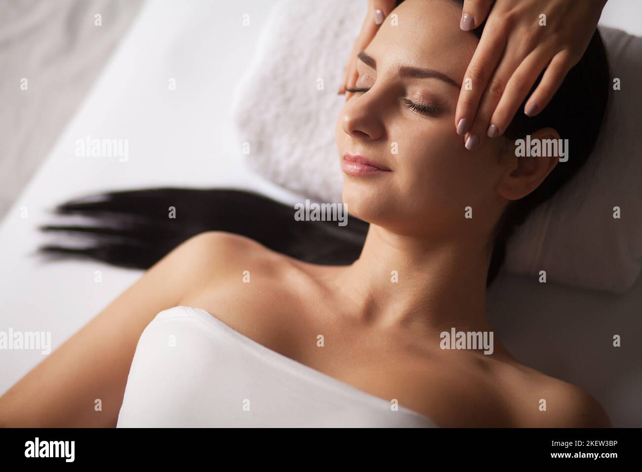 Face Massage. Close-up of a Young Woman Getting Spa Treatment Stock ...