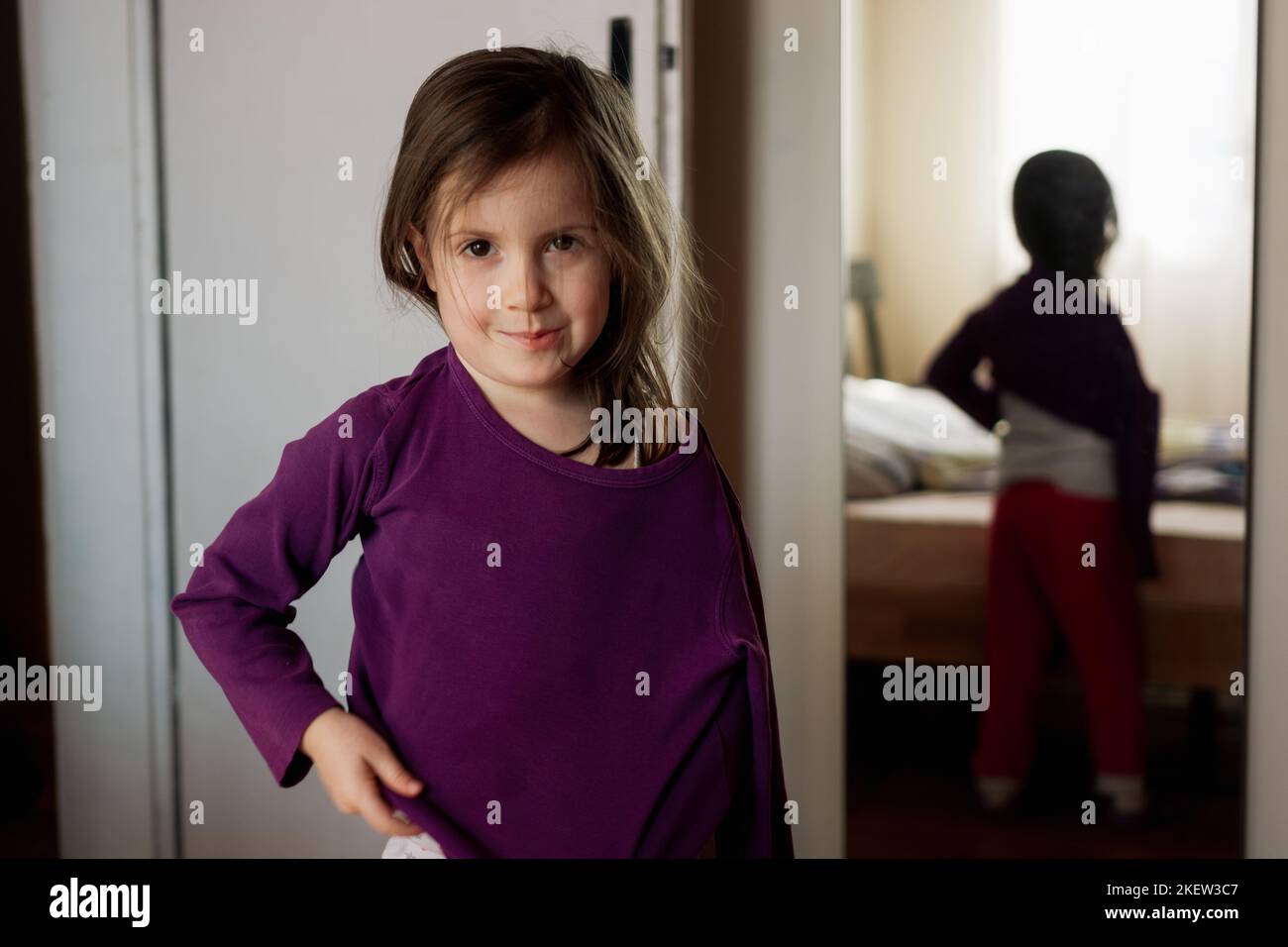 Girl getting dressed hi-res stock photography and images - Alamy