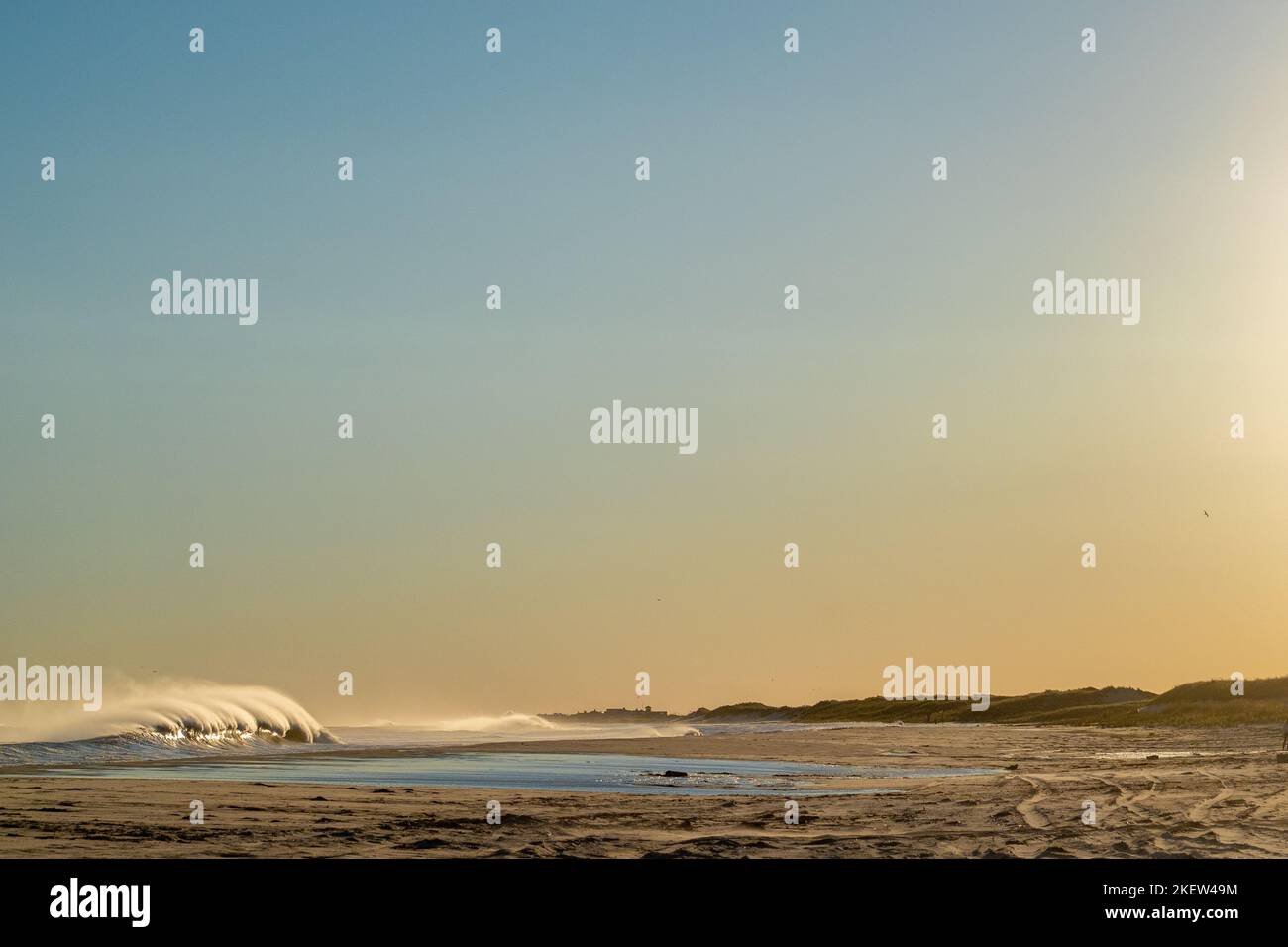 wide angle landscape of the beaches on long island. Sunset with blue ...