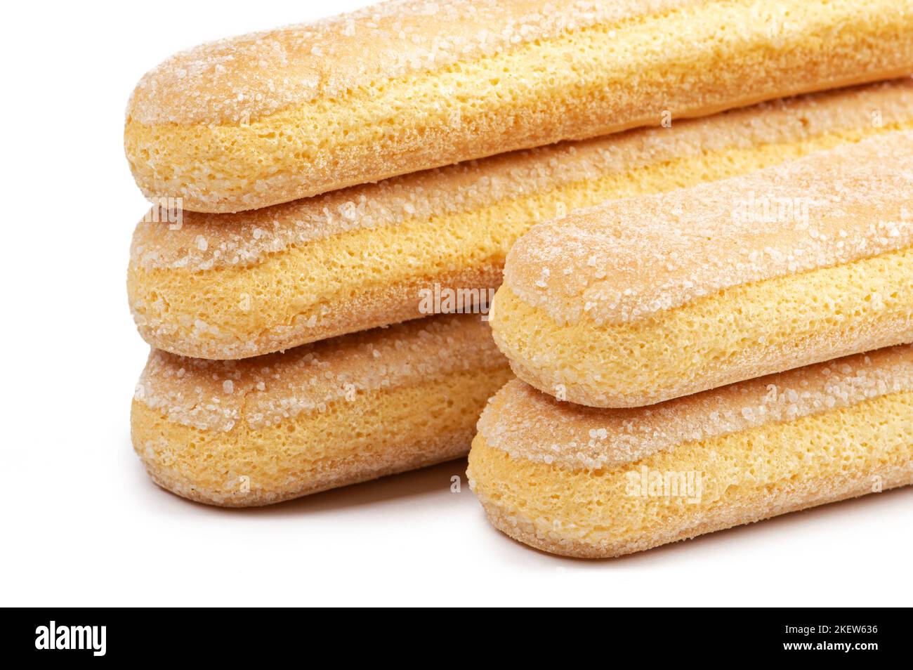 Pile of italian cookie savoiardi on white. Ladyfingers biscuits Stock ...