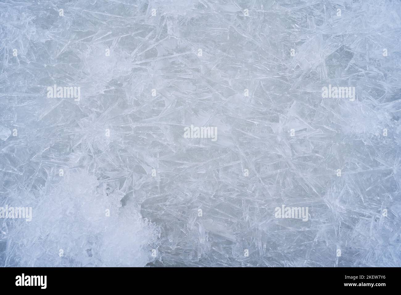Fresh ice surface texture. Winter background with frozen snowflakes and ...