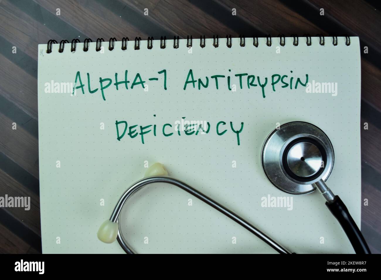 Concept of Alpha-1 Antitrypsin Deficiency write on a book isolated on ...