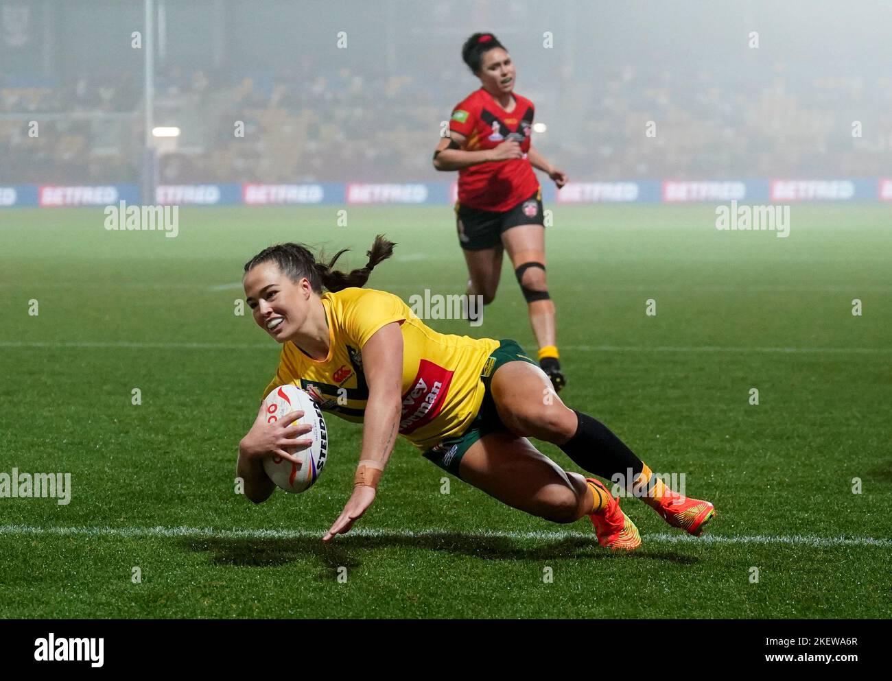 Australia's Isabelle Kelly scores their side's third try during the ...