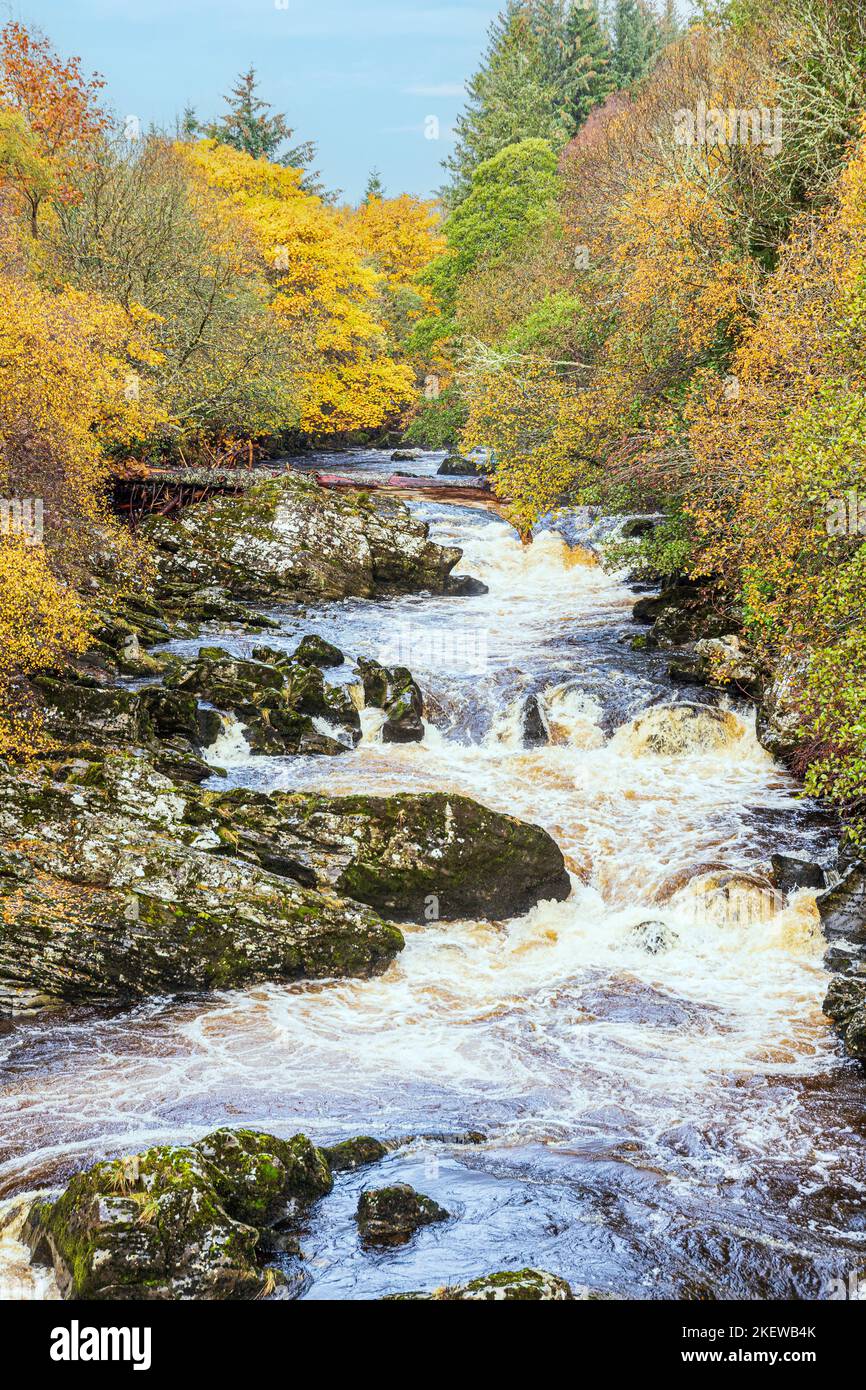 The Black Water River (which drains Glen Shee as Shee Water) in autumn ...