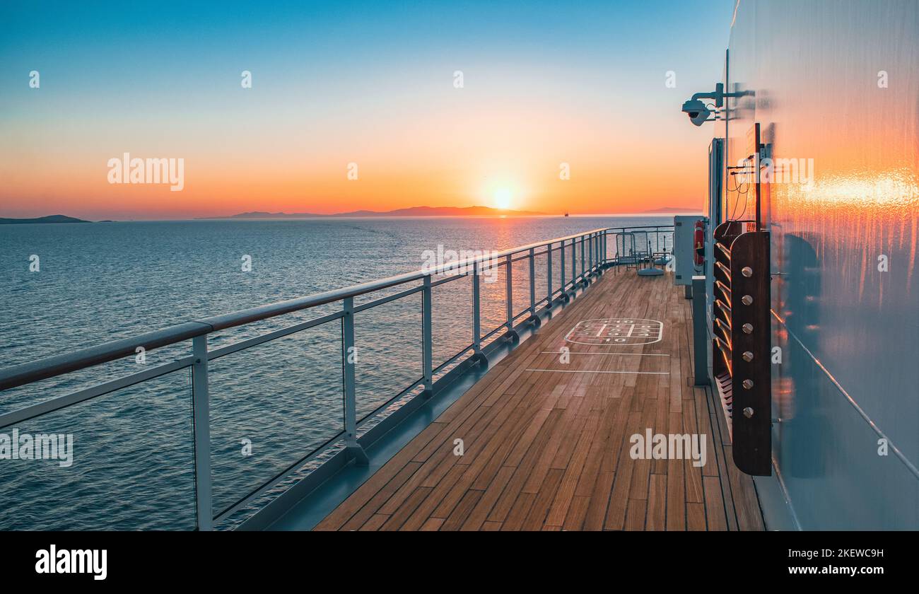 Wooden cruise deck at sunset Stock Photo - Alamy