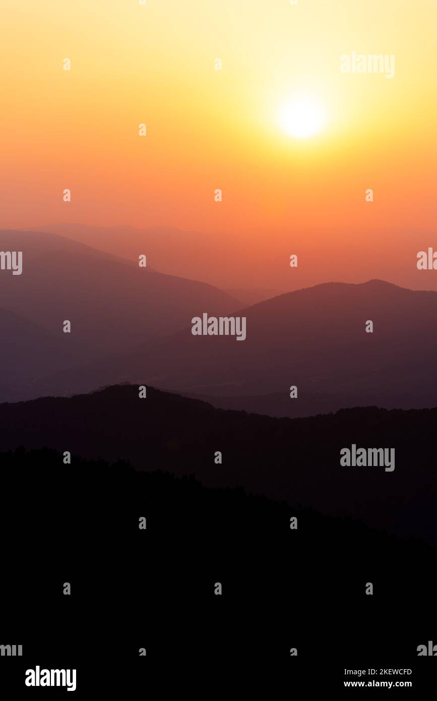 Minimal background with sunrise in the mountains Stock Photo - Alamy