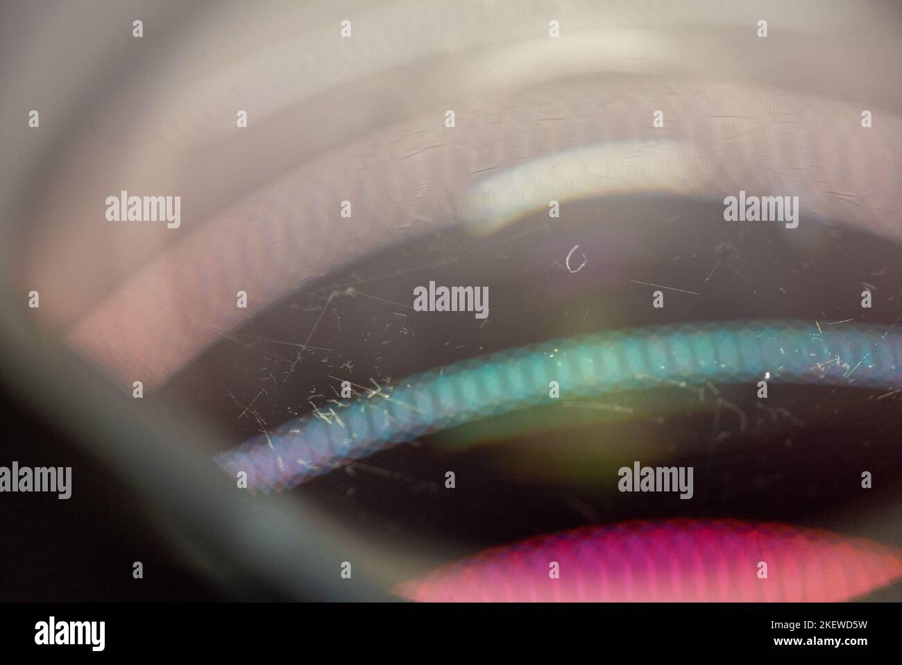 Close up shot showing small scratches on a camera lens glass ...