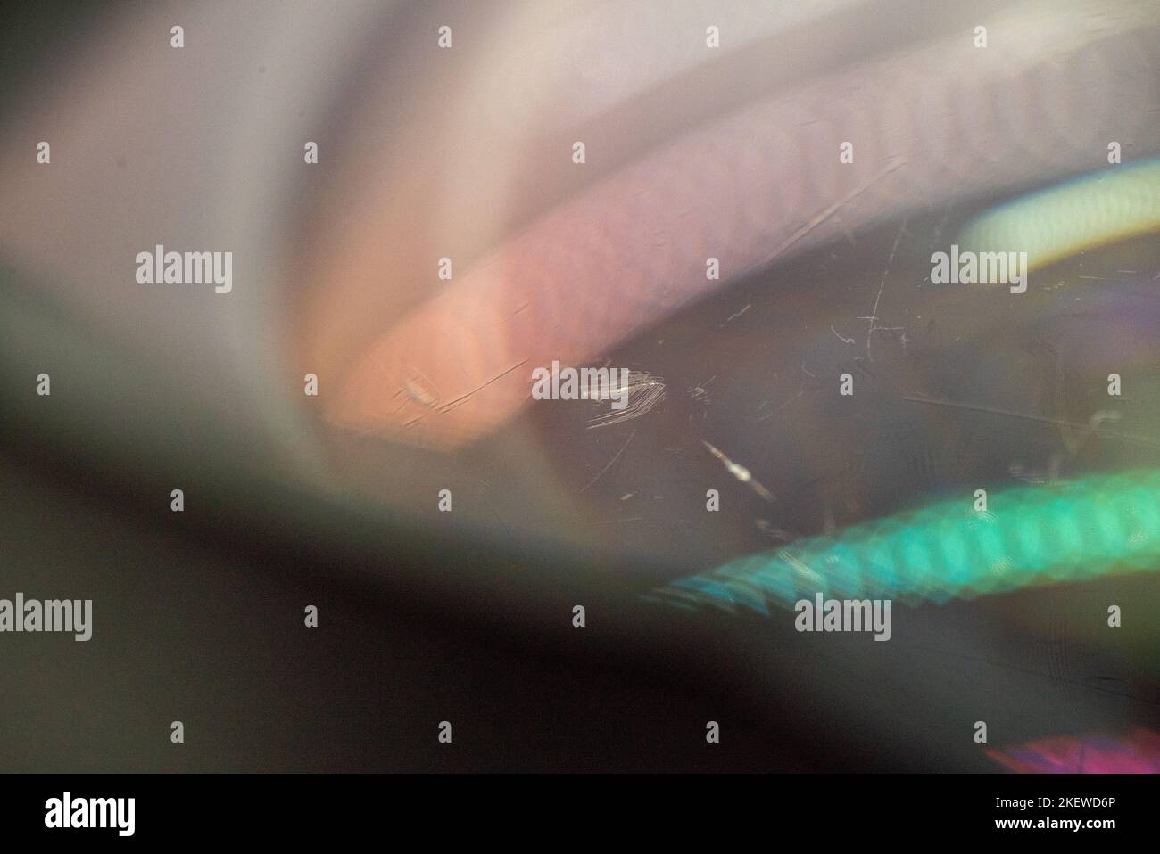 Close up shot showing small scratches on a camera lens glass ...