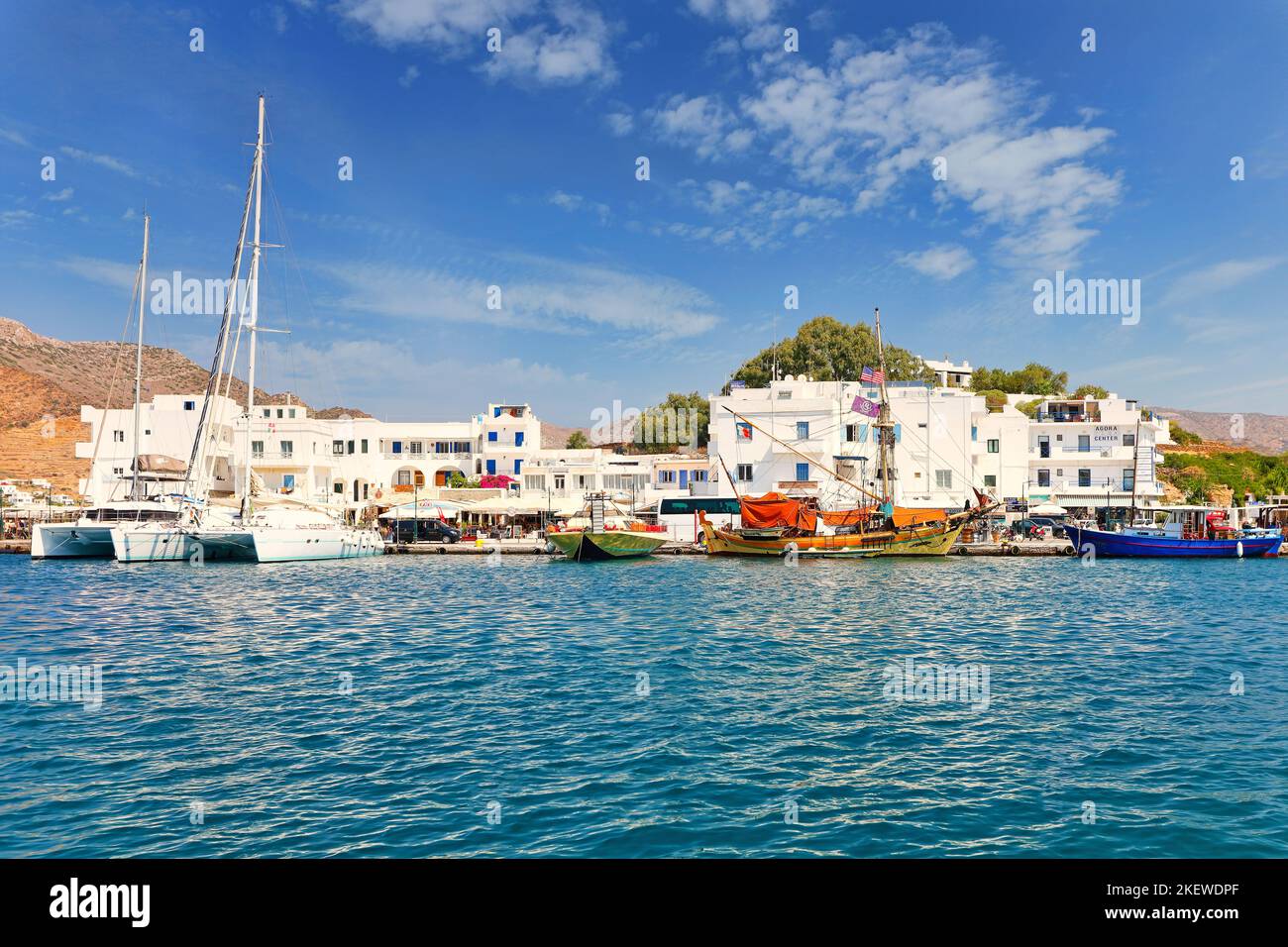 Boats at the picturesque port of Ios island, Greece Stock Photo - Alamy