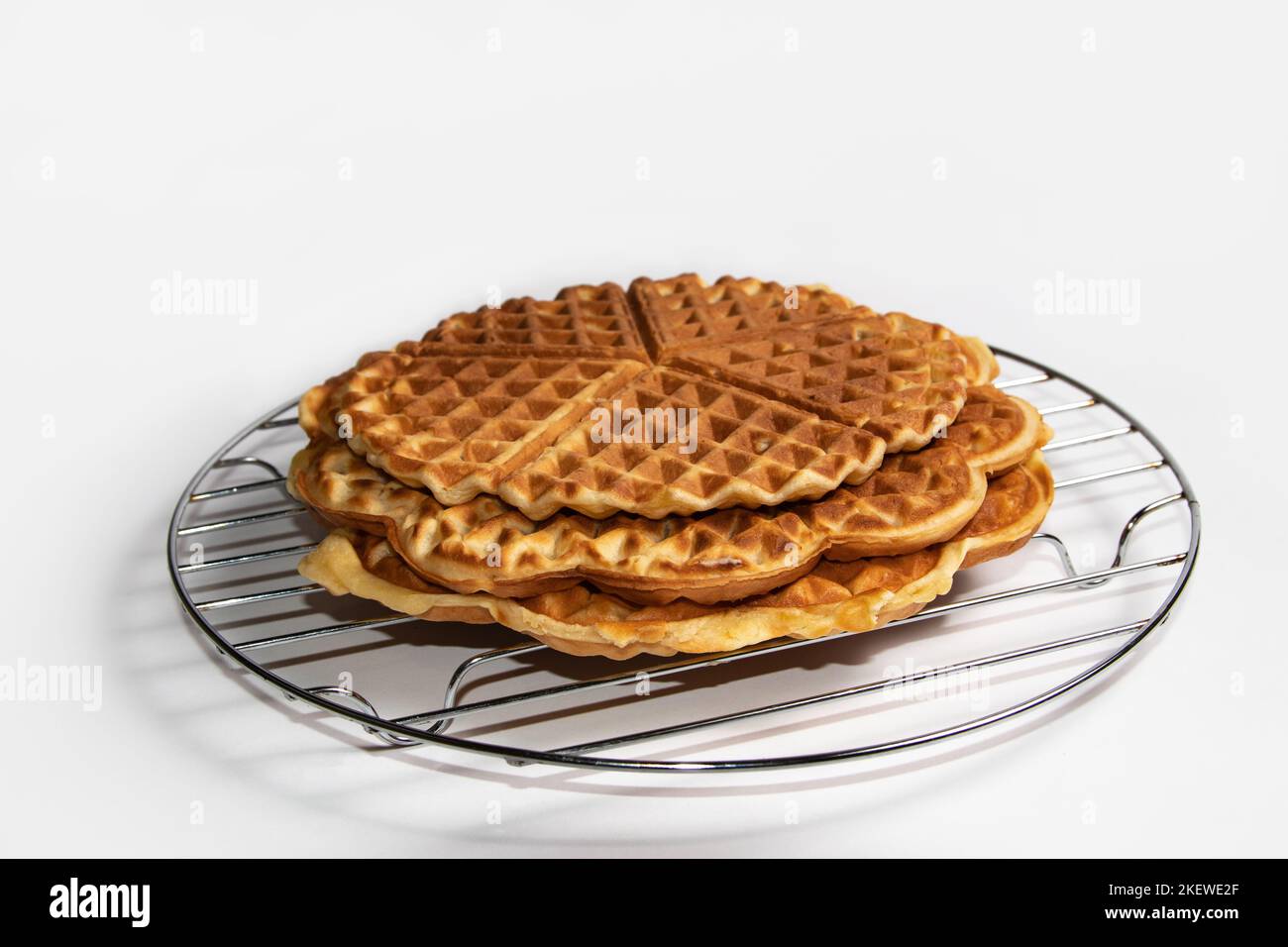 Waffles cooling on a metal rack Stock Photo - Alamy