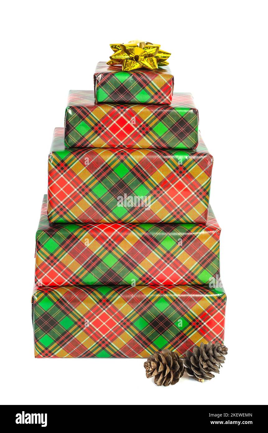 A pile of Christmas gifts in green-red checkered paper in the form of a ...