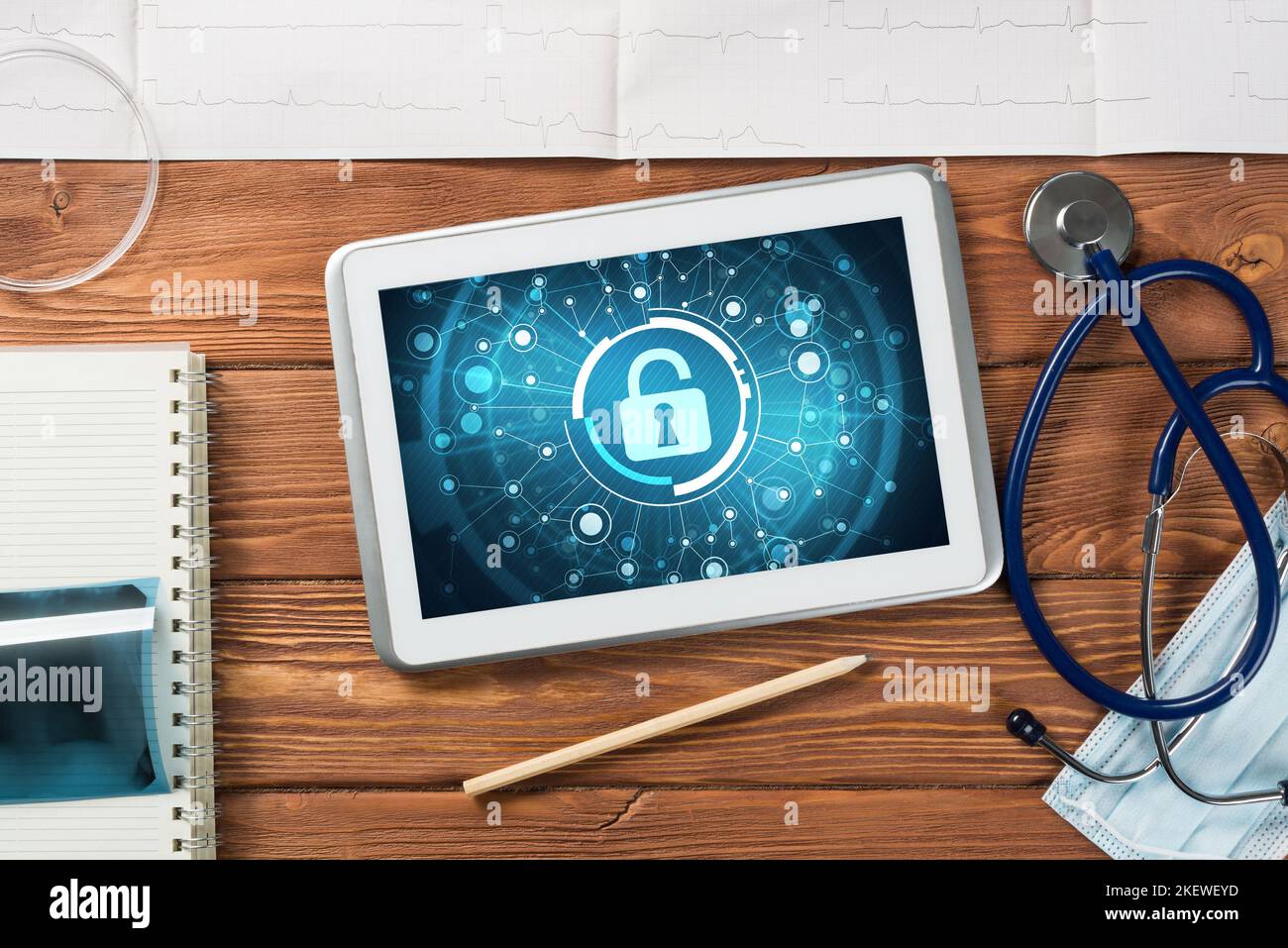 Web security and technology concept with tablet pc on wooden table ...