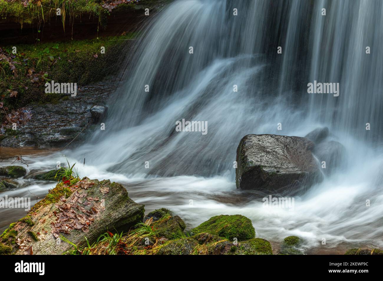 Fresh water waterfall on rocks moss cover in mountain. Fresh water ...