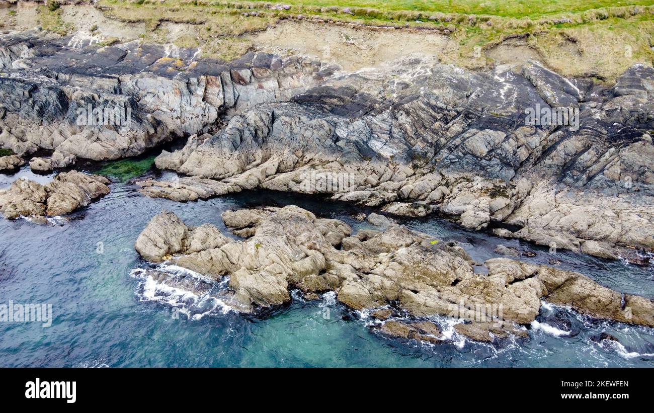Coastal rocks under sea water, seascape. The coastline of the Atlantic ...
