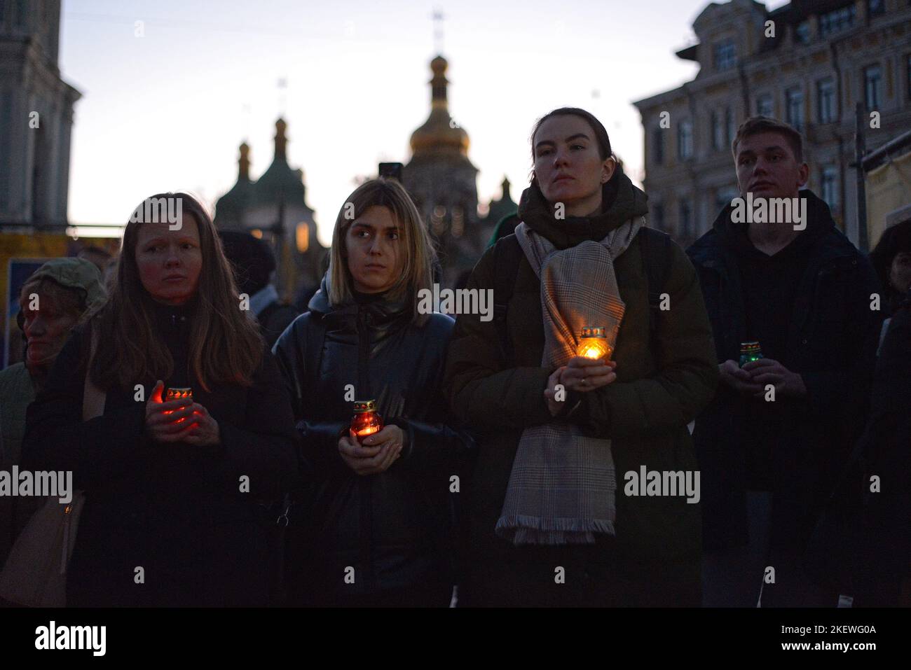 KYIV, UKRAINE - NOVEMBER 13, 2022 - People hold lit candles to ...