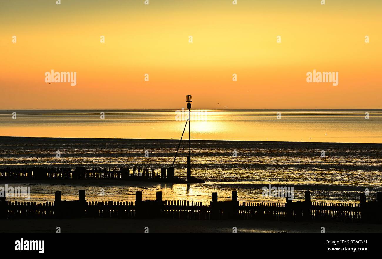 Sunset at Hunstanton, Norfolk, UK Stock Photo - Alamy