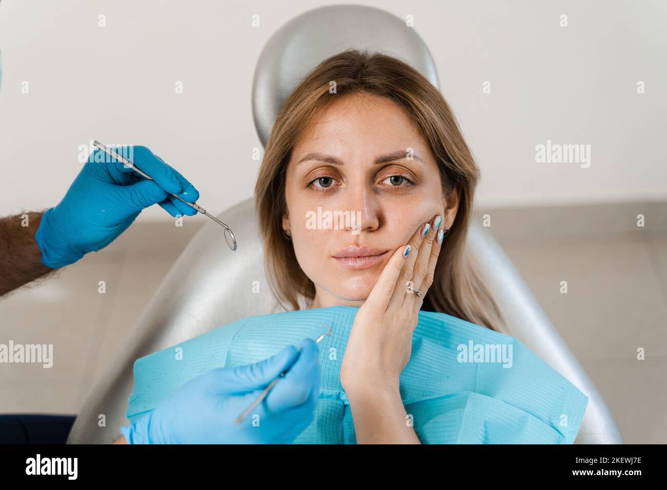 Strong toothache in woman. Upset girl with teeth ache. Consultation and ...