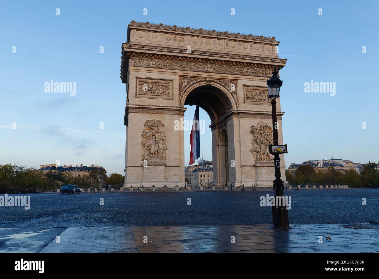 The Triumphal Arch decorated with French flag, Paris, France Stock ...