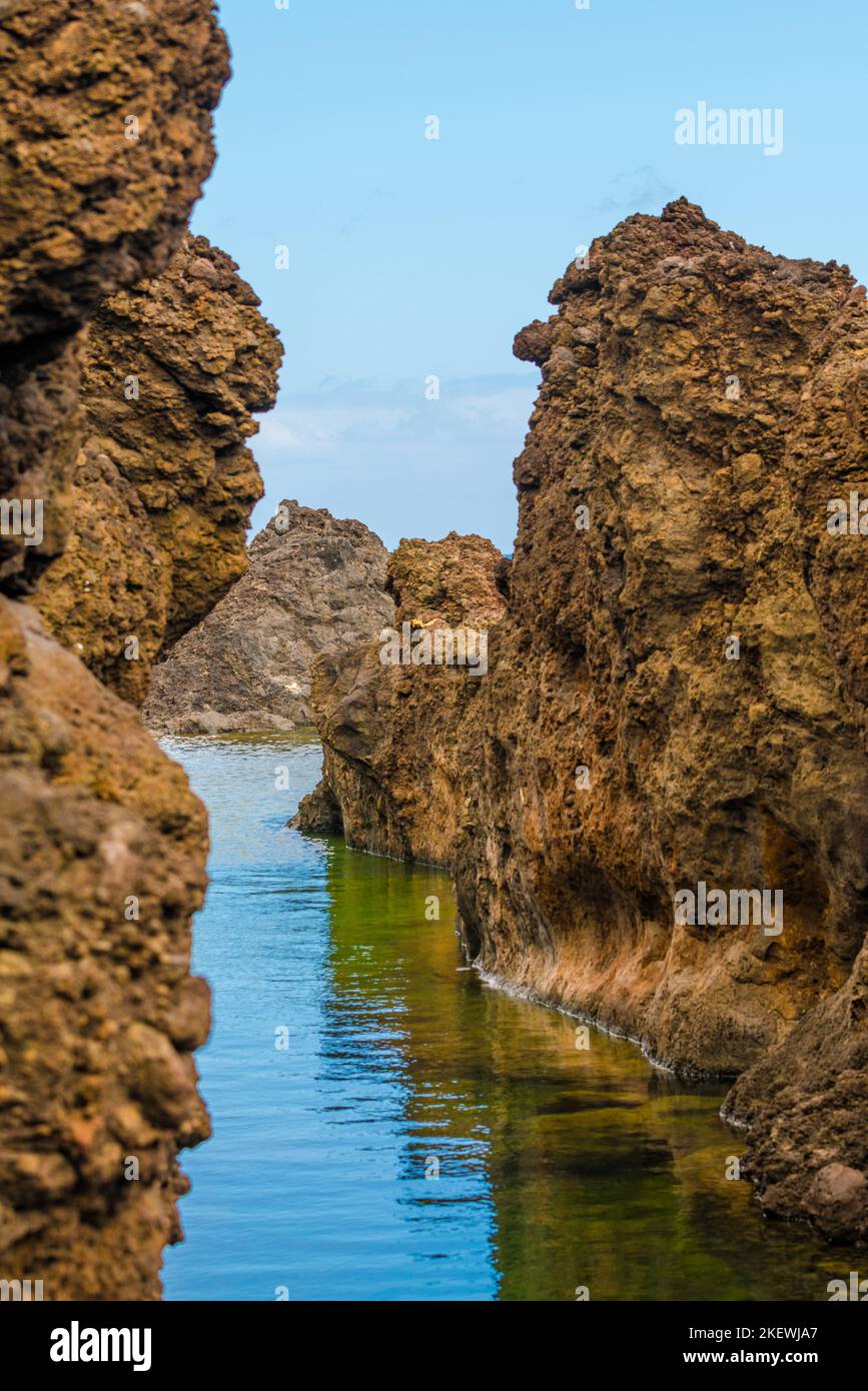 Natural pools with black volcanic rock in the Atlantic Ocean Porto ...