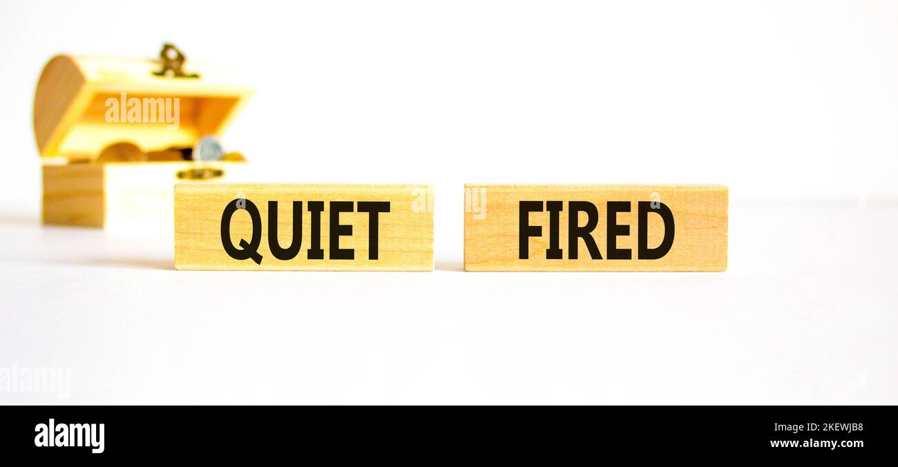 Quiet fired symbol. Concept words Quiet fired on wooden blocks ...