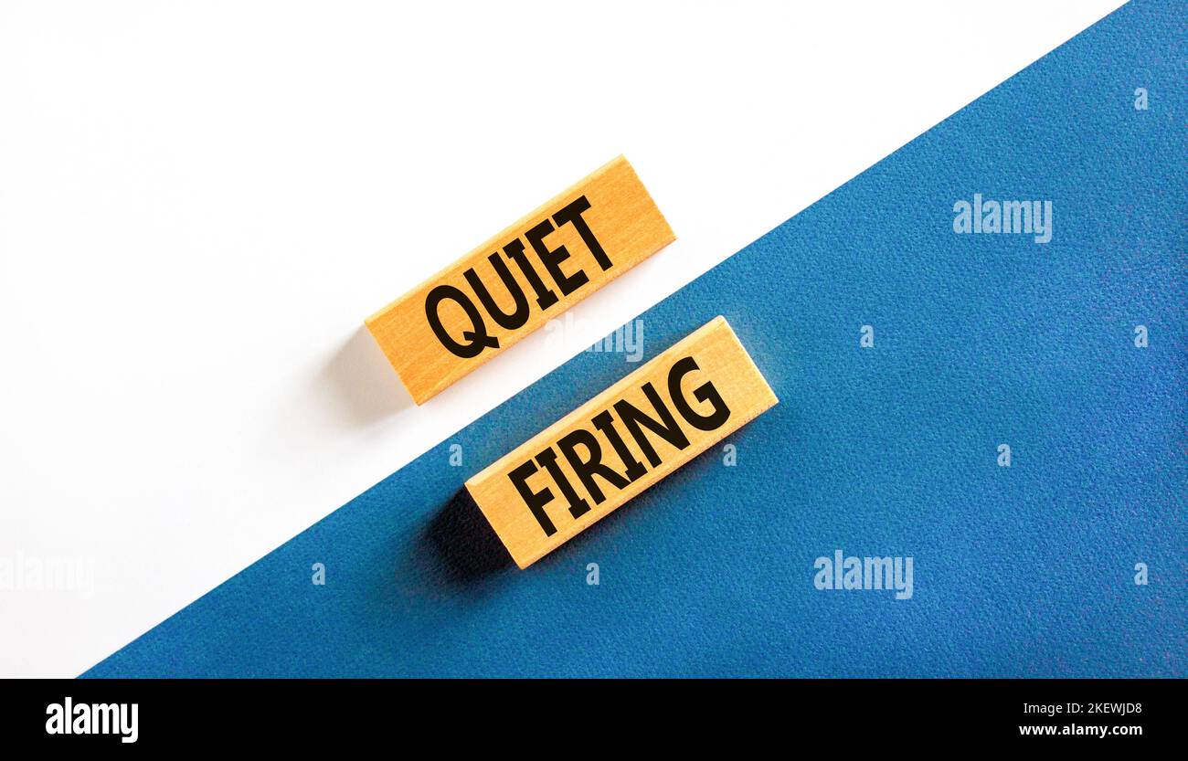 Quiet firing symbol. Concept words Quiet firing on wooden blocks ...