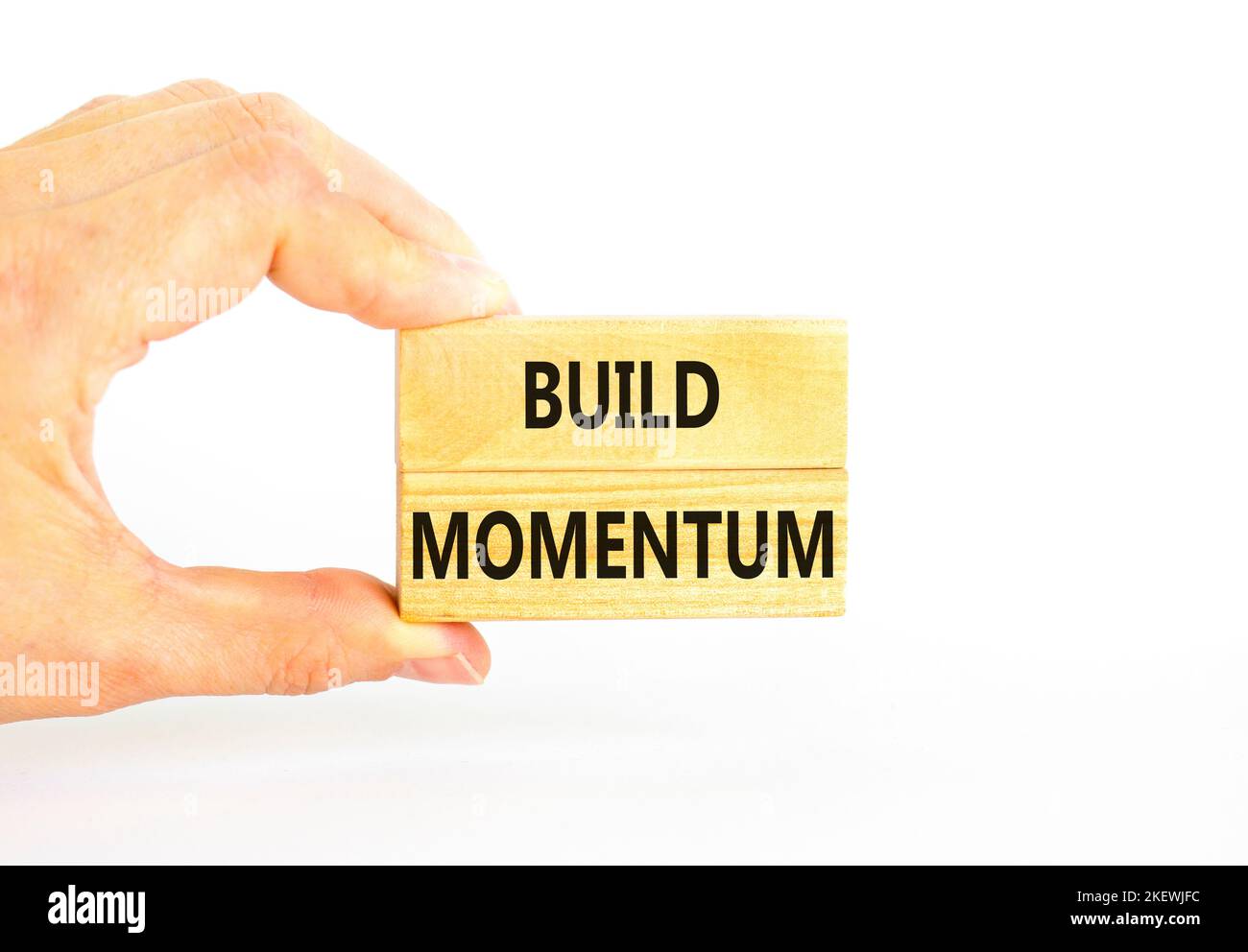 Build momentum symbol. Concept words Build momentum on wooden blocks ...