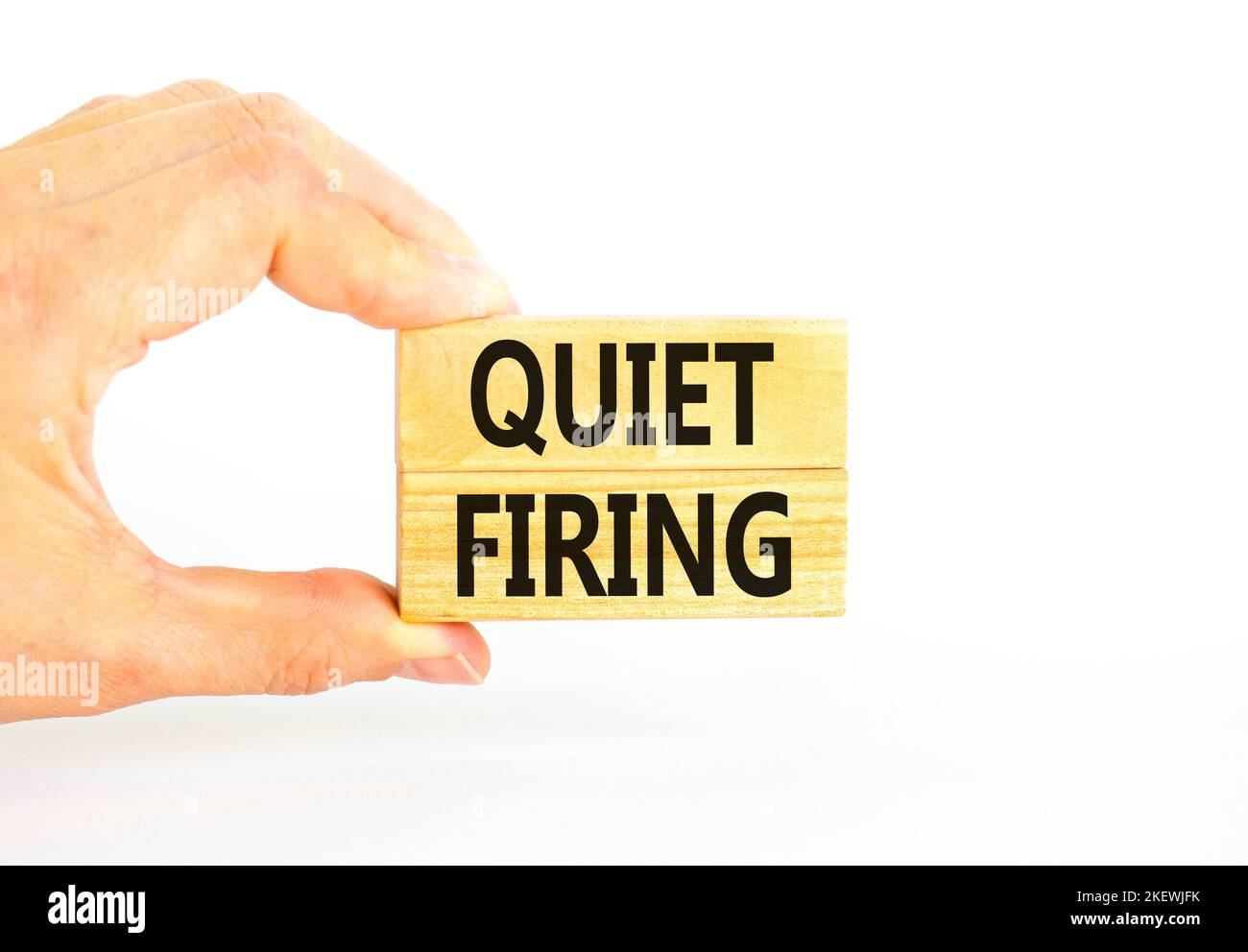 Quiet firing symbol. Concept words Quiet firing on wooden blocks ...