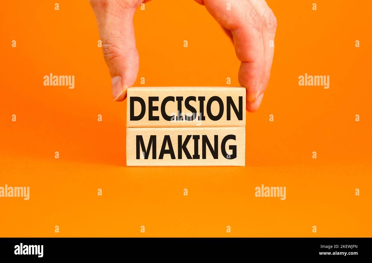 Decision making symbol. Concept words Decision making on wooden blocks ...
