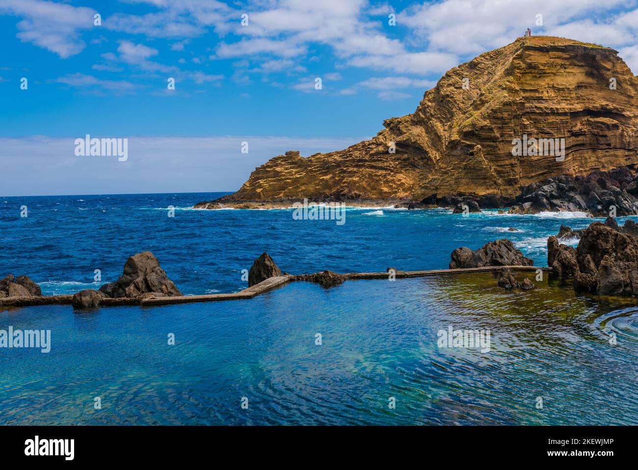 Natural pools with black volcanic rock in the Atlantic Ocean Porto ...