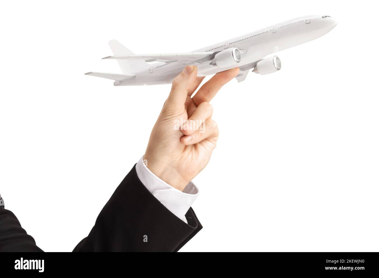 Male hand holding a model airplane isolated on white background Stock ...