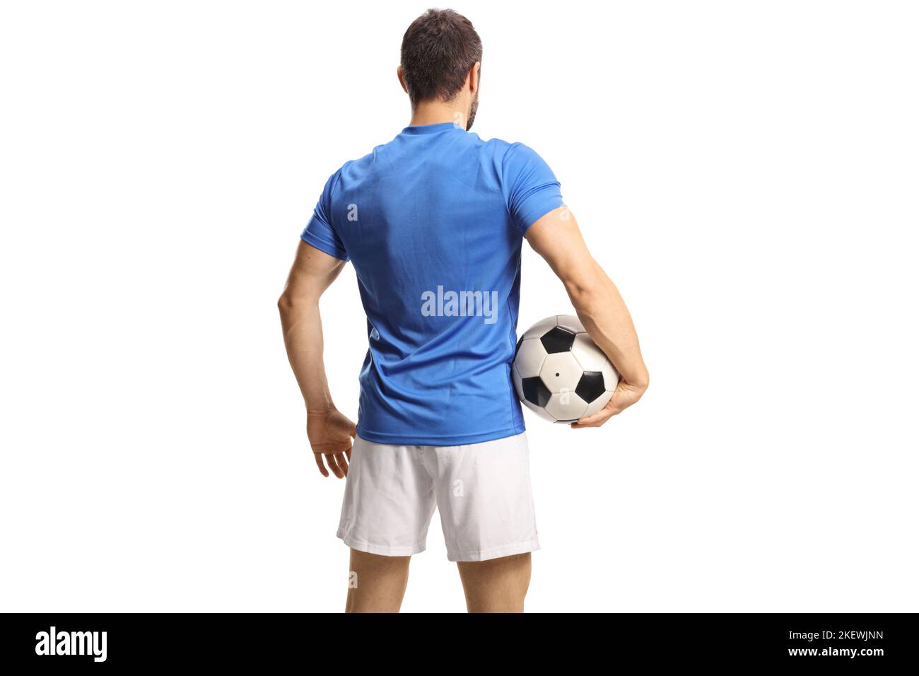 Rear view shot of a football player holding a ball isolated on white ...