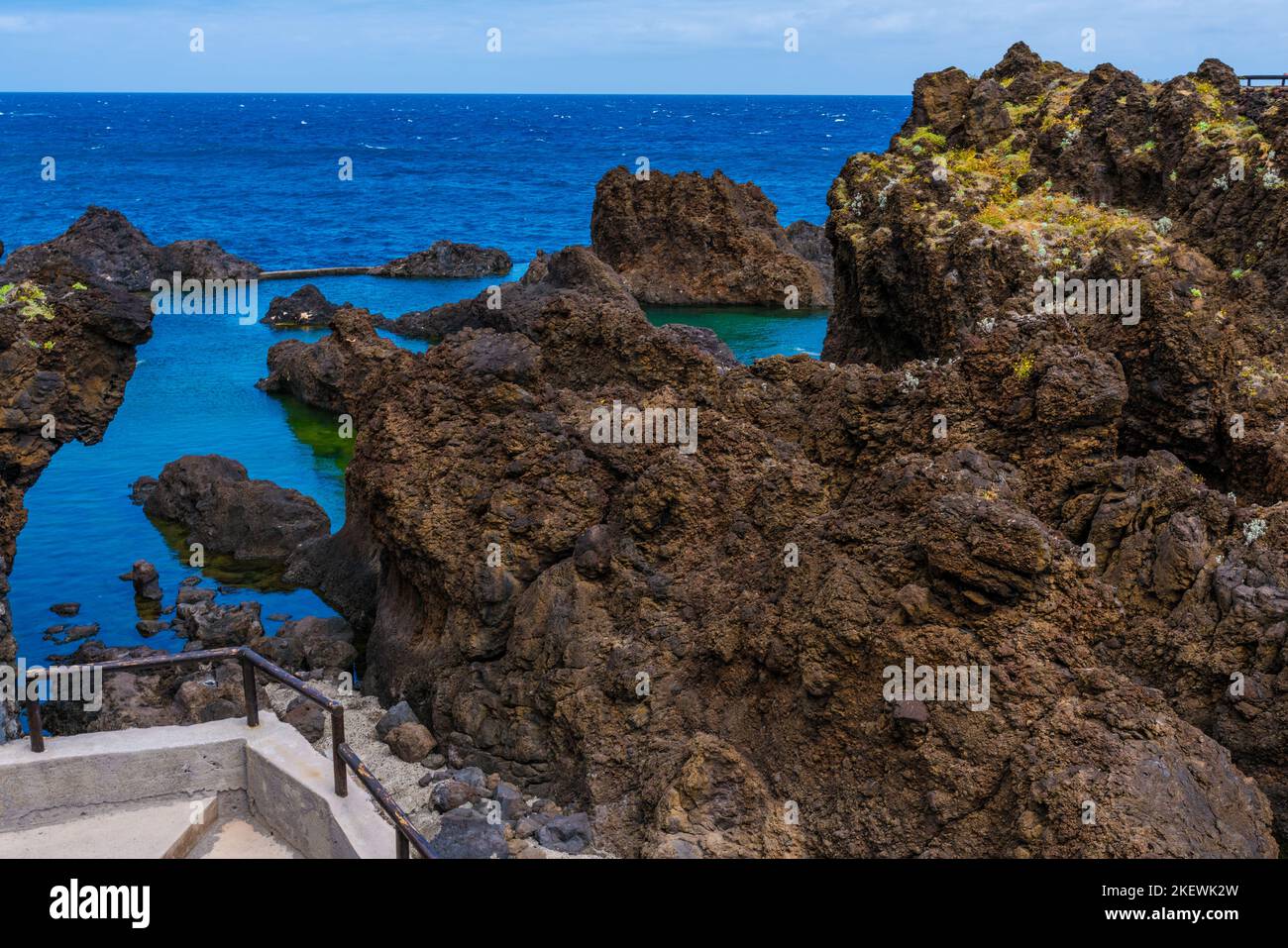 Natural pools with black volcanic rock in the Atlantic Ocean Porto ...
